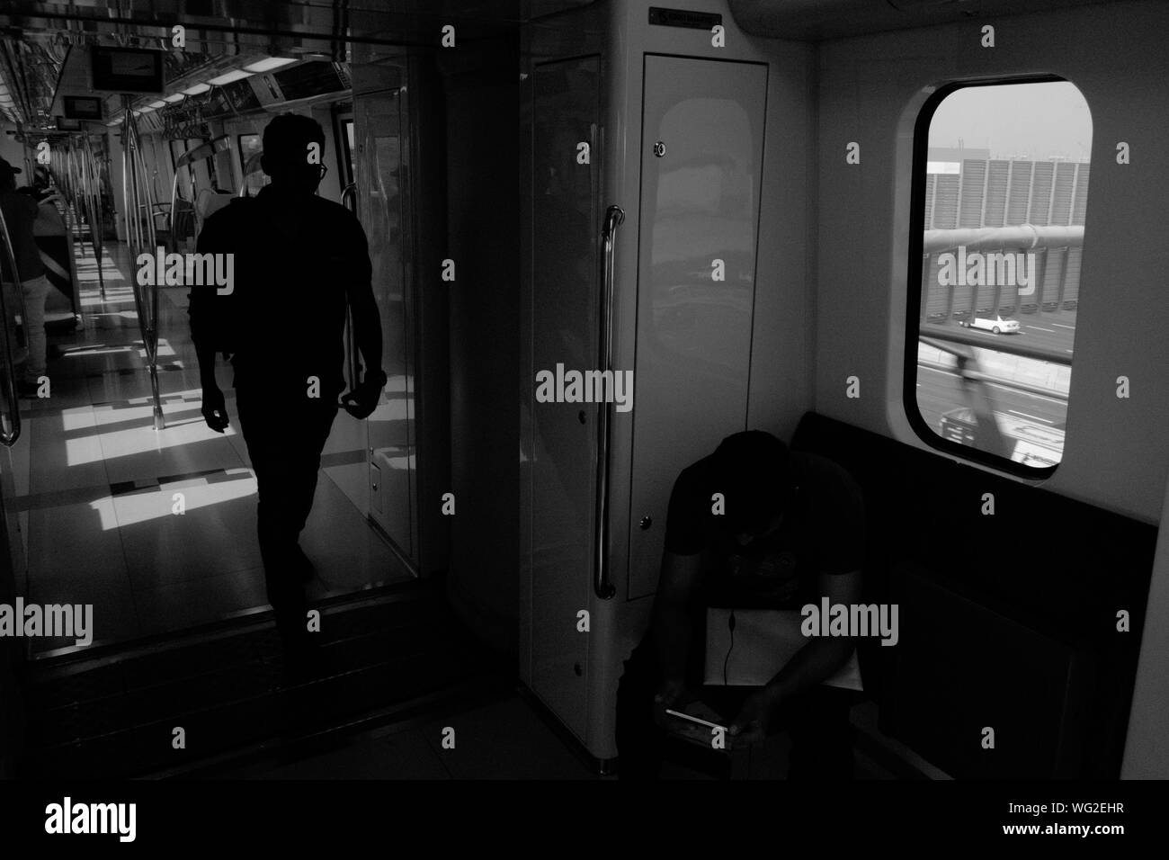 Two people sitting in train hi-res stock photography and images - Alamy