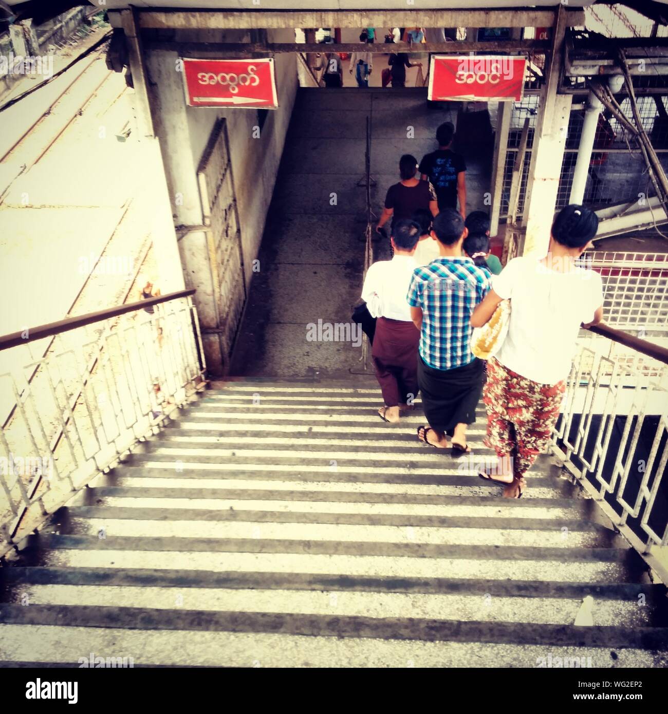 Group of people walking down stairs hi-res stock photography and images ...