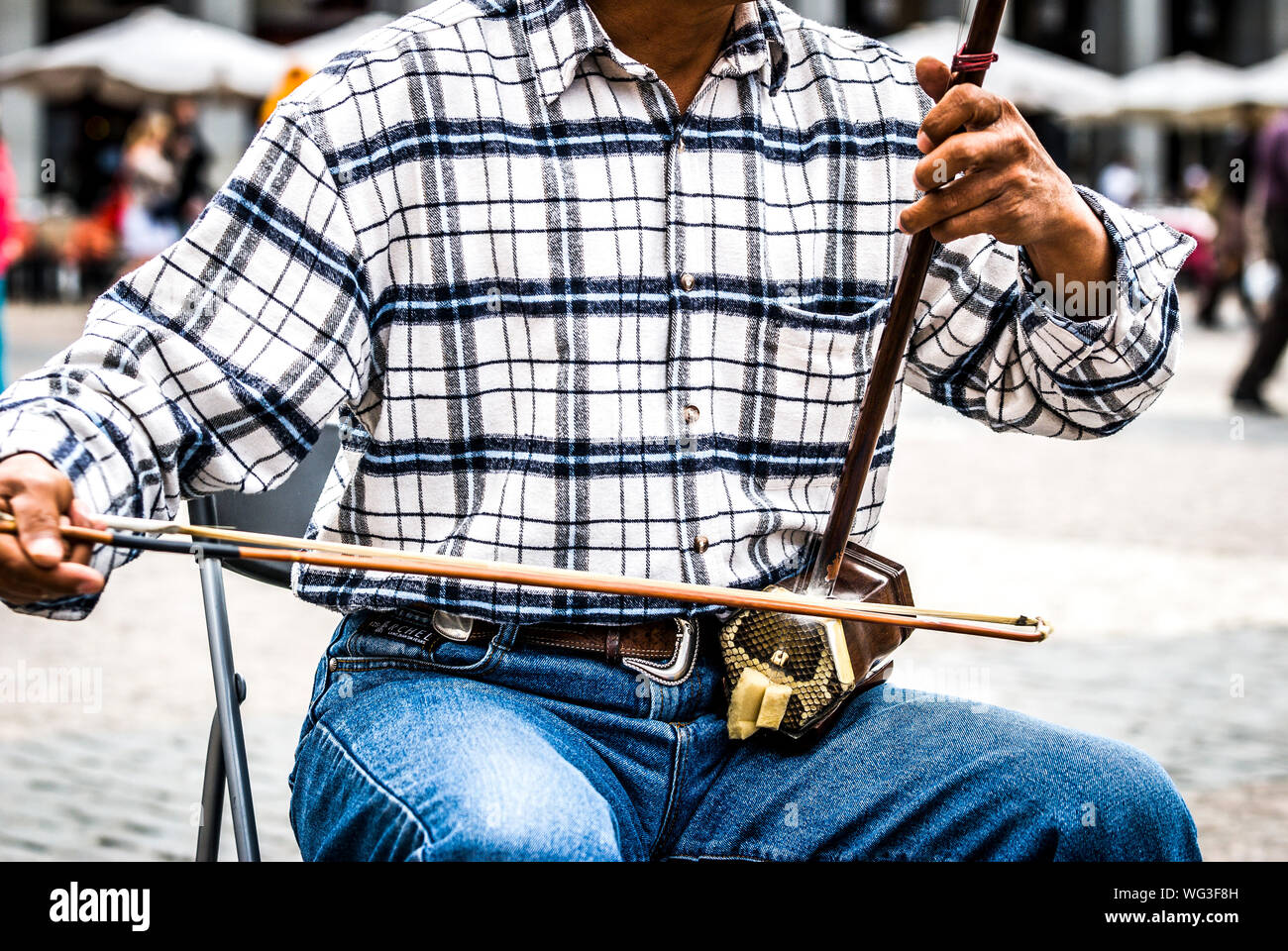 Holding an instrument hi-res stock photography and images - Alamy