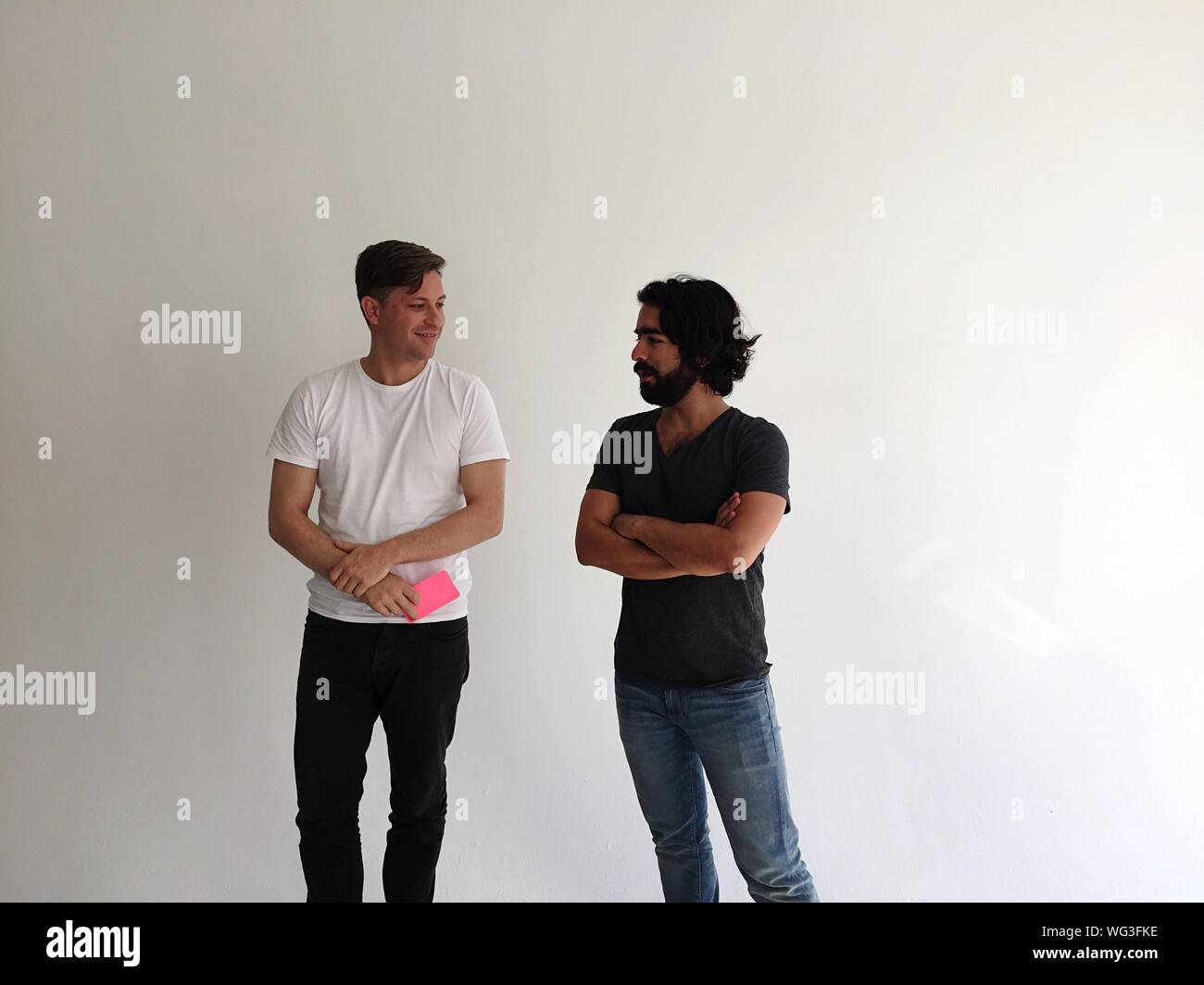 Two white men talking hi-res stock photography and images - Alamy