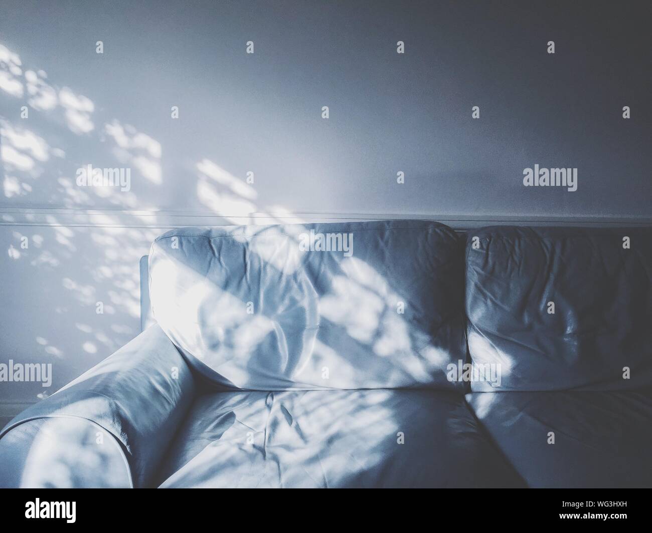 Falling on to sofa hi-res stock photography and images - Alamy