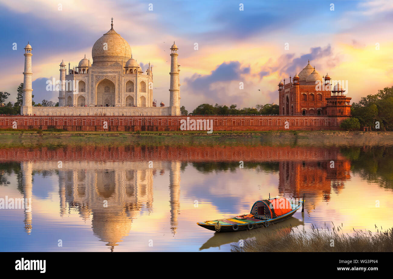 Taj Mahal Agra on the banks of river Yamuna at sunset with moody sky ...