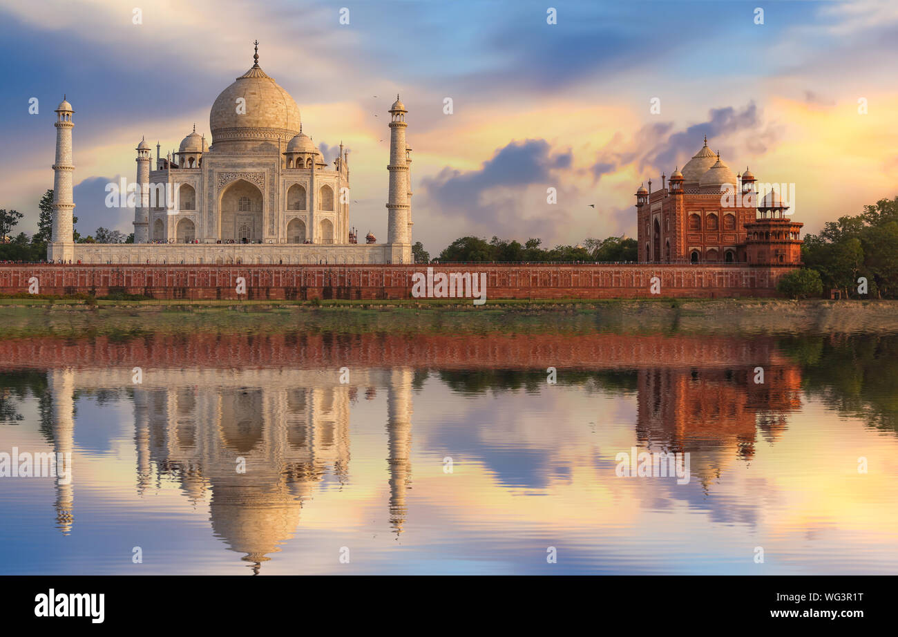 Taj Mahal Agra at sunset with water reflection and moody sky. Taj Mahal ...