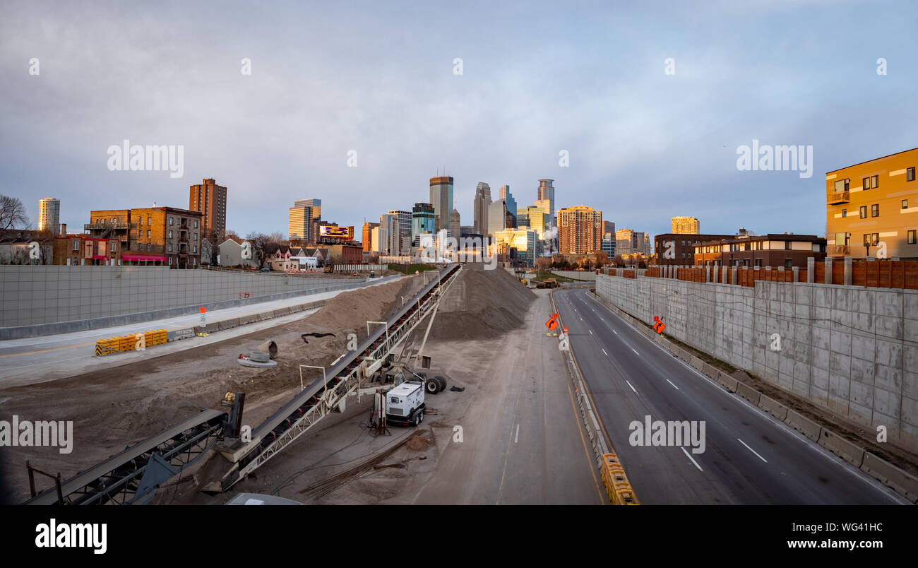 Downtown Minneapolis seen from freeway with construction and signs at ...