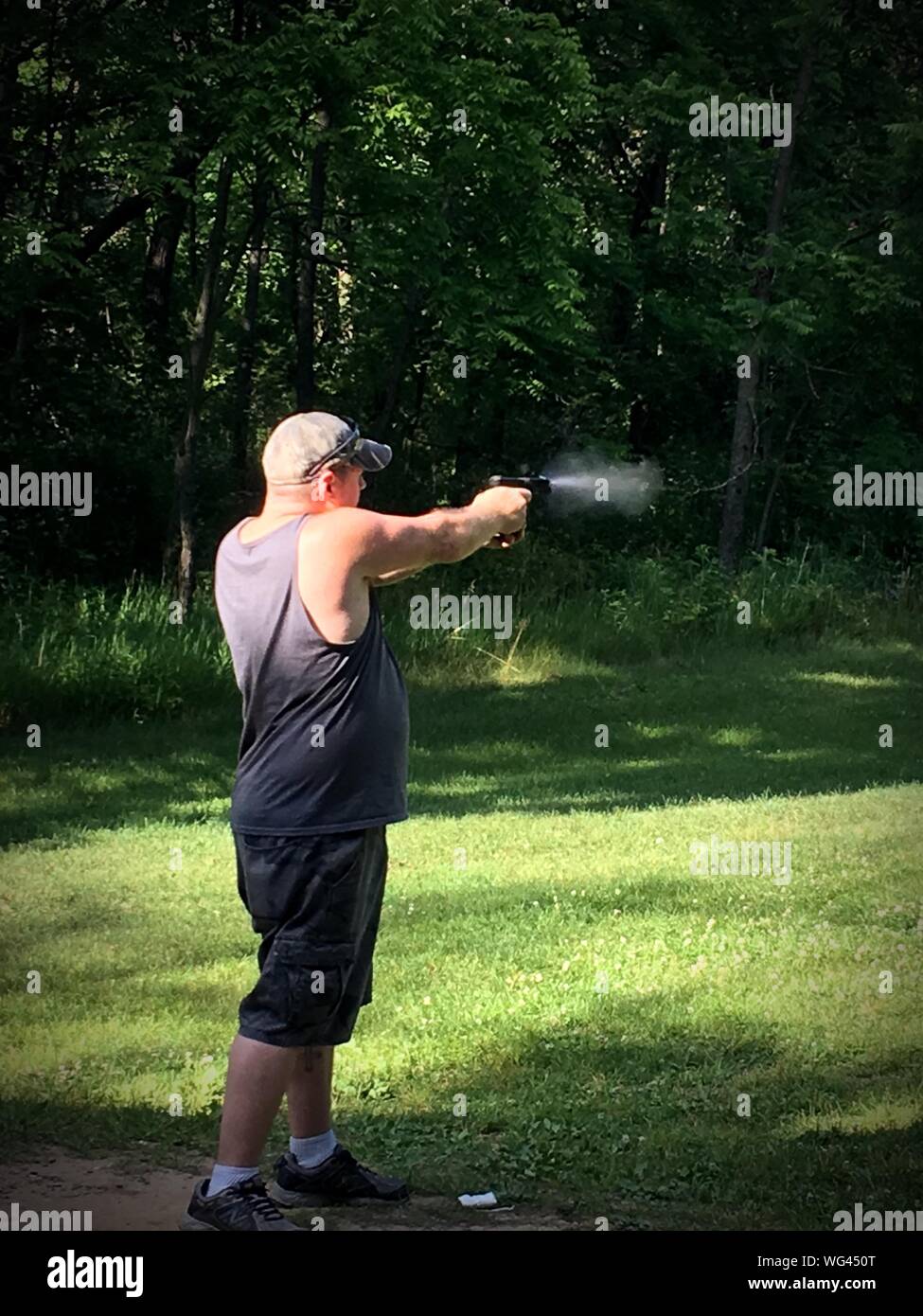 Man Shooting Gun High Resolution Stock Photography and Images - Alamy