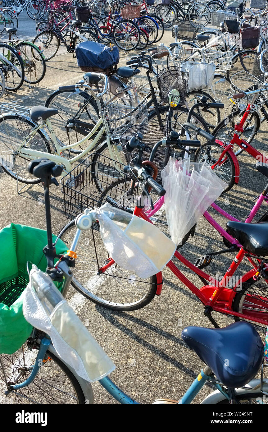 Push bikes parking japan hi-res stock photography and images - Alamy