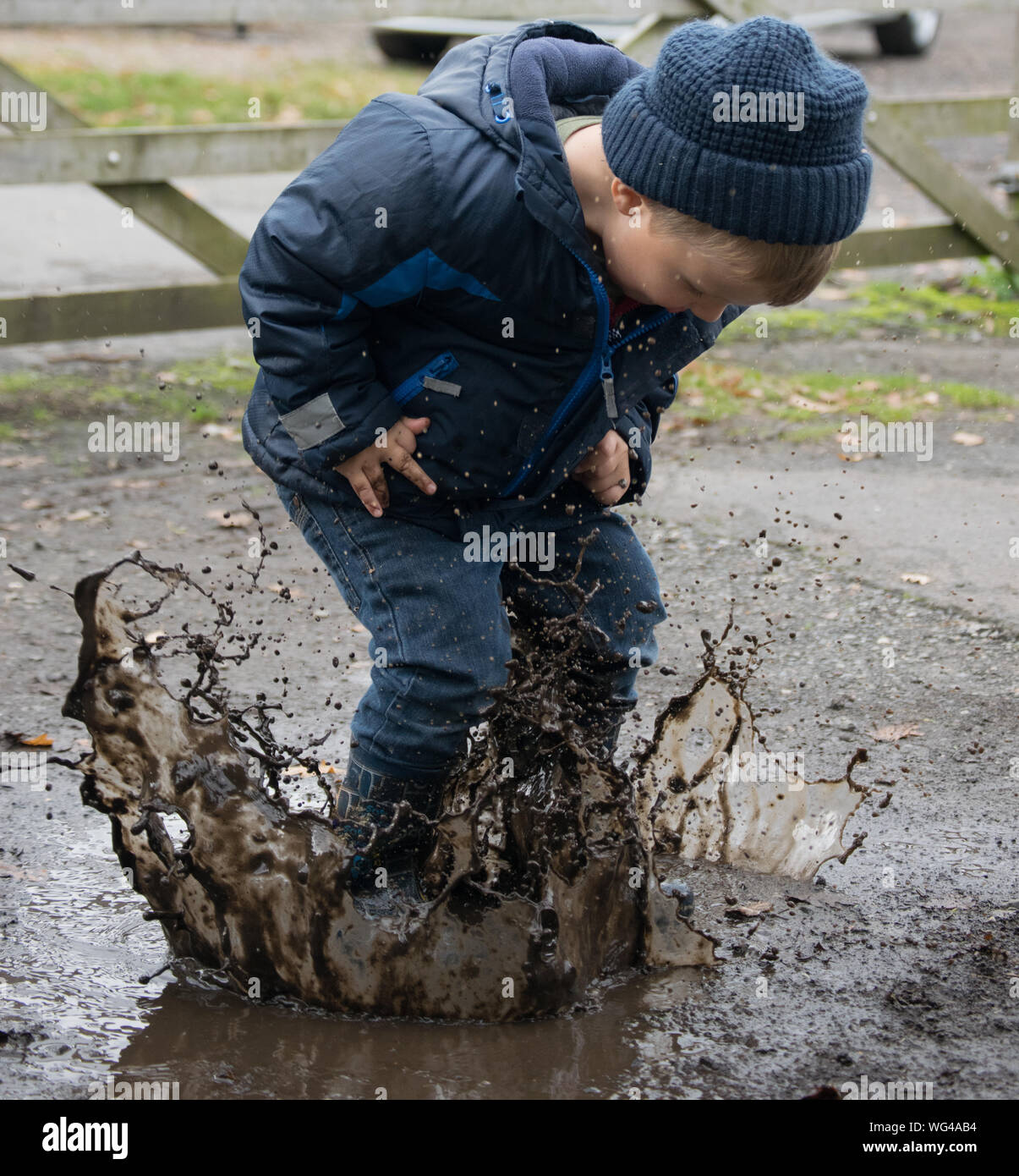 Jumping in mud puddle hi-res stock photography and images - Alamy