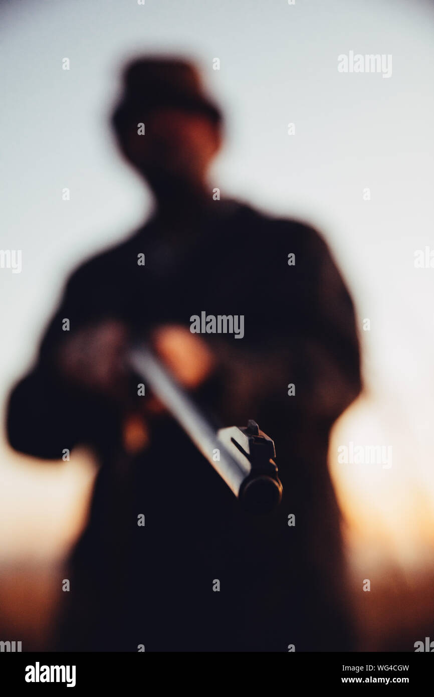 Hand holding gun pointing hi-res stock photography and images - Alamy