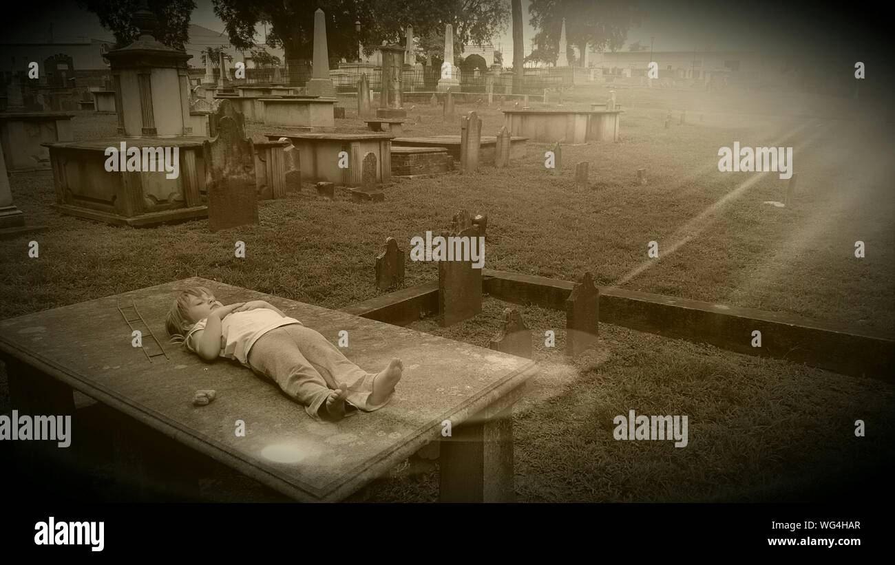 Girl at the cemetery hi-res stock photography and images - Alamy