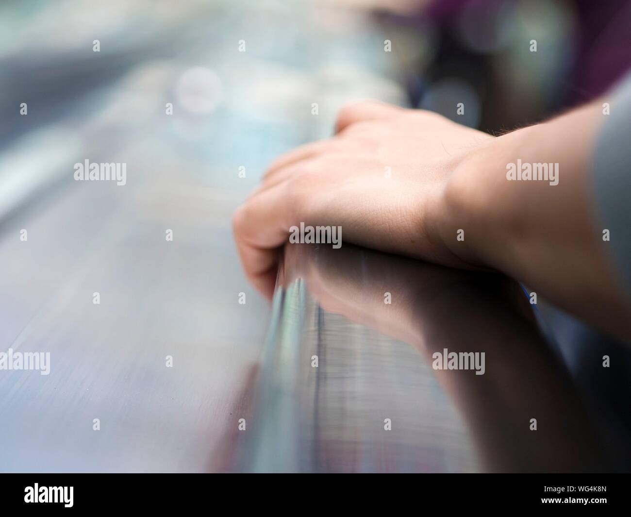 Hand holding railing hi-res stock photography and images - Alamy