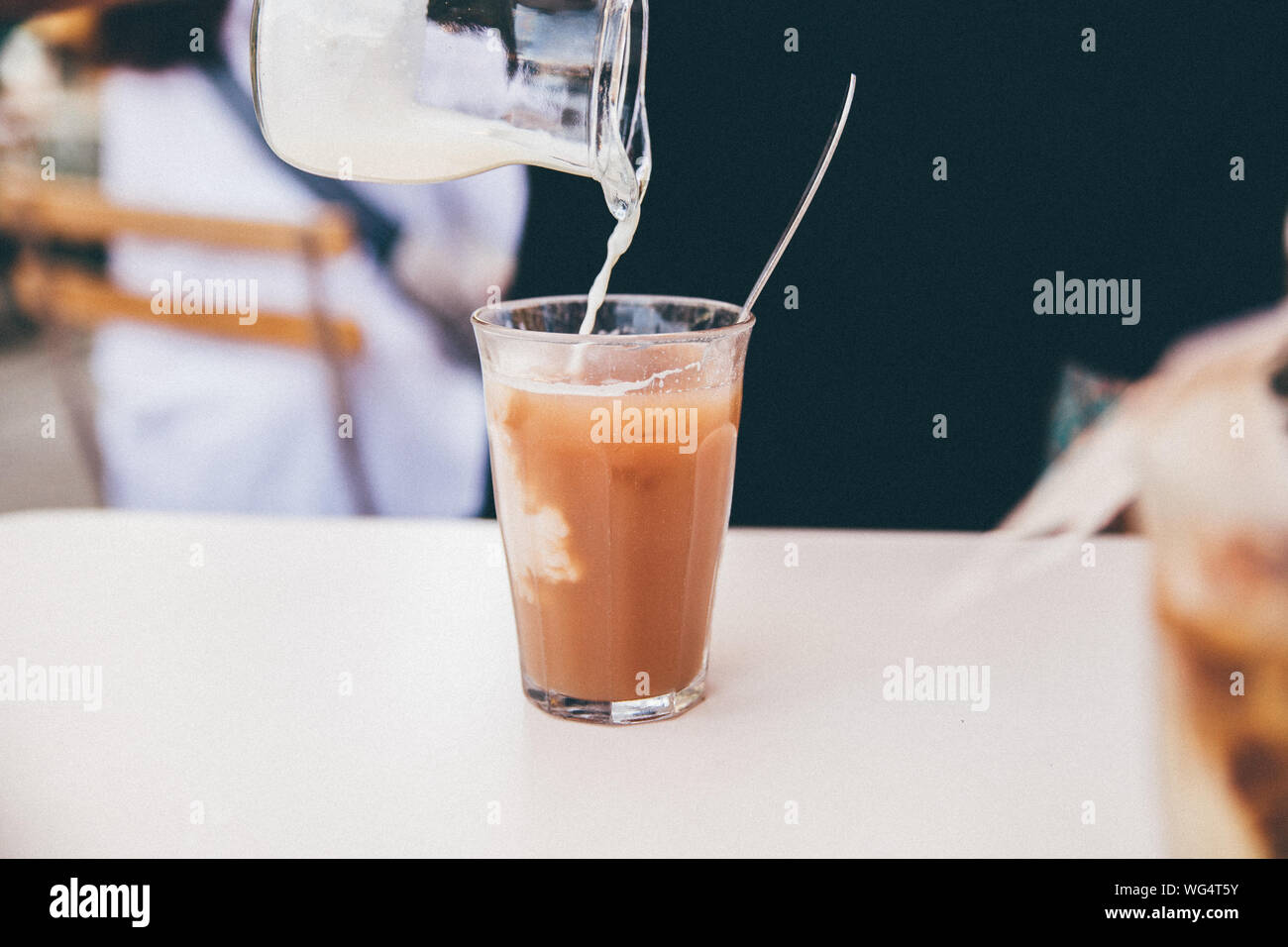 Milk Pouring Into Tea High Resolution Stock Photography and Images - Alamy