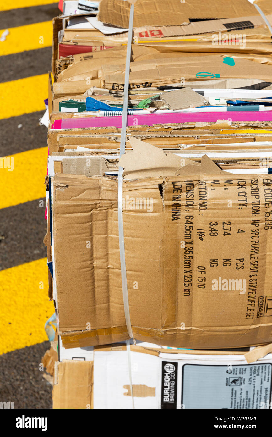 Bound cardboard stacked in collection zone ready for recycling Stock ...
