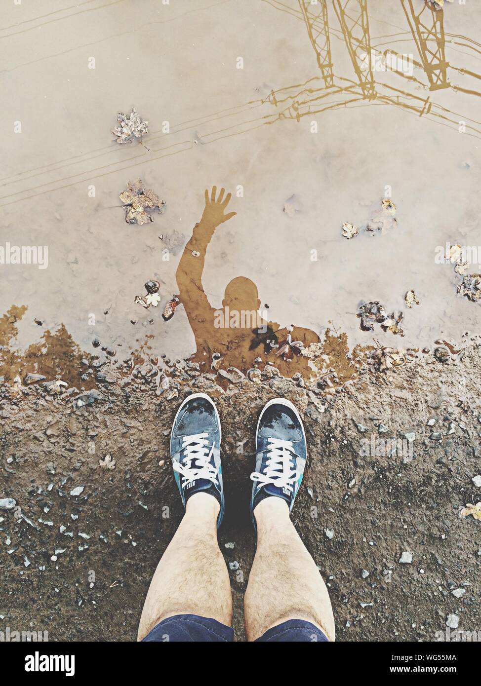 Reflection of a man in water hi-res stock photography and images - Alamy