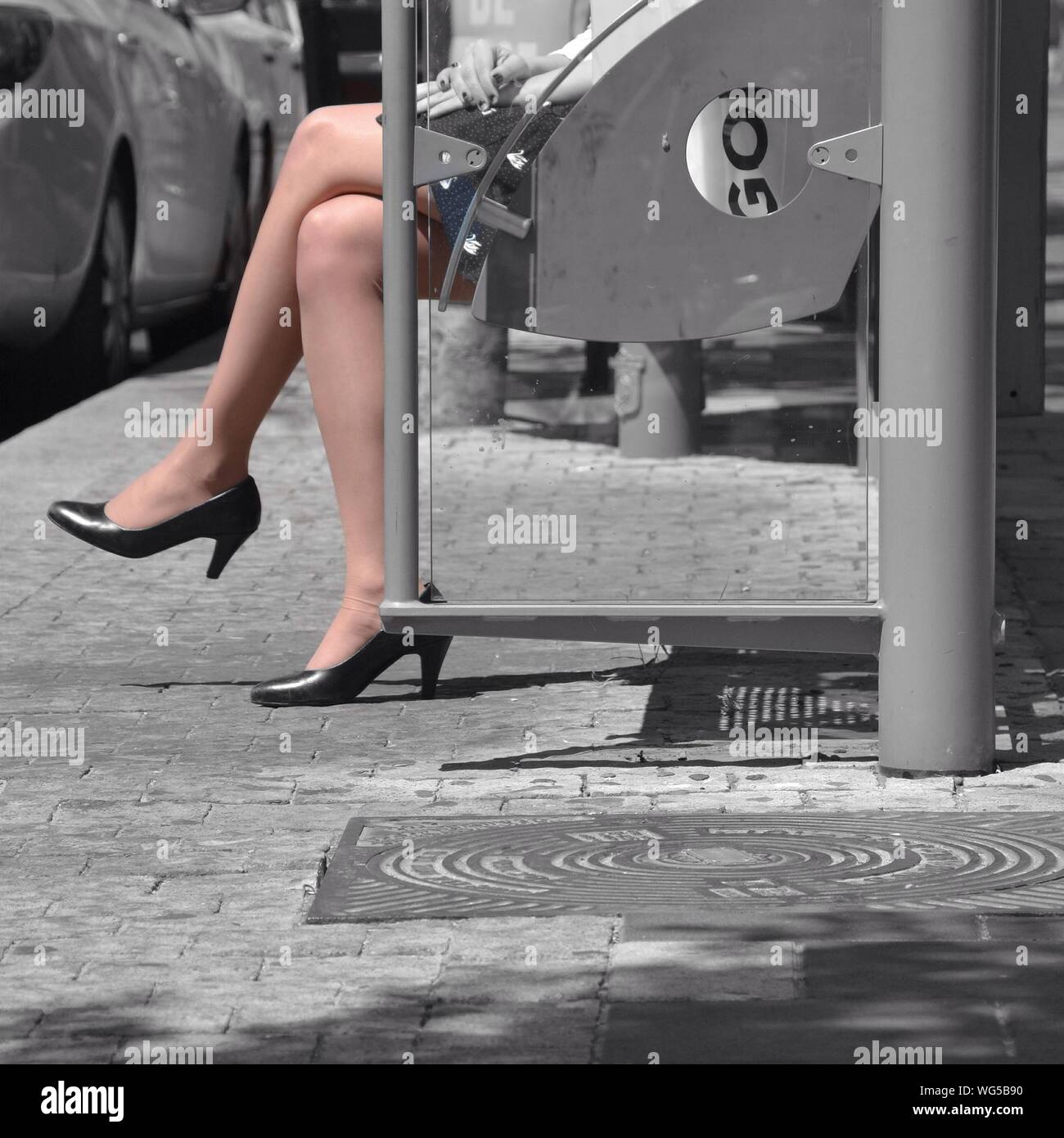 Young woman bus stop hi-res stock photography and images - Alamy