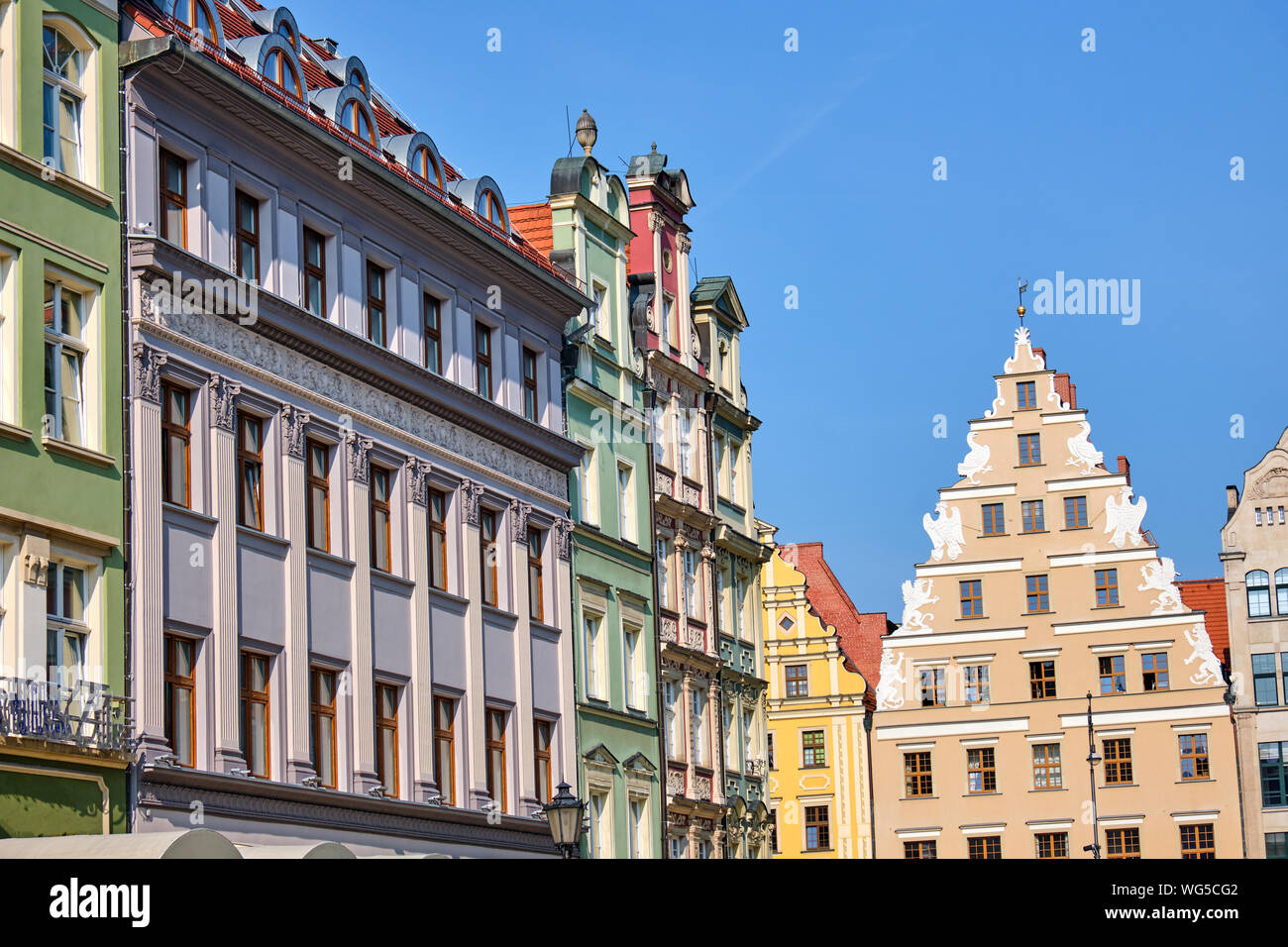 Beautiful multi colored houses at the market square in Wroclaw, Poland ...