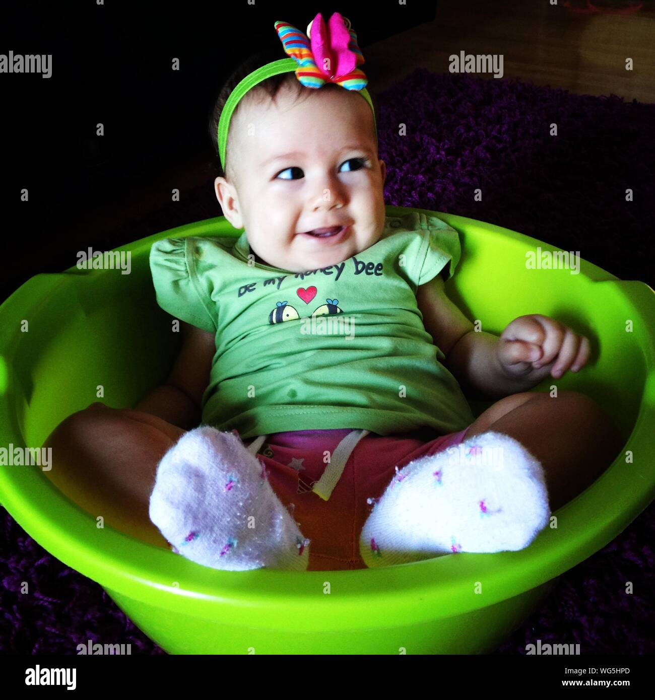 Baby in bucket hi-res stock photography and images - Alamy