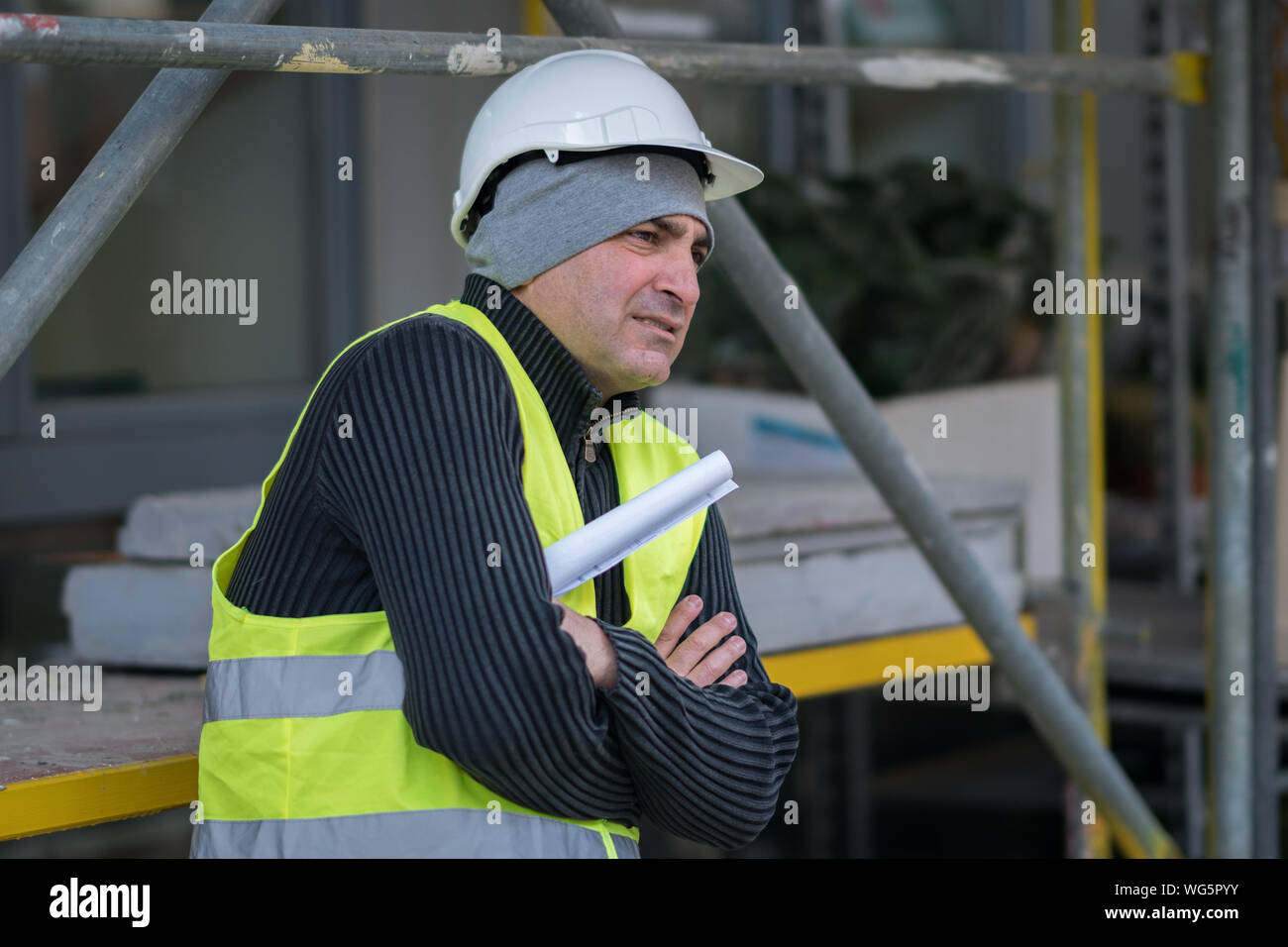 Construction arms crossed on construction hi-res stock photography and ...