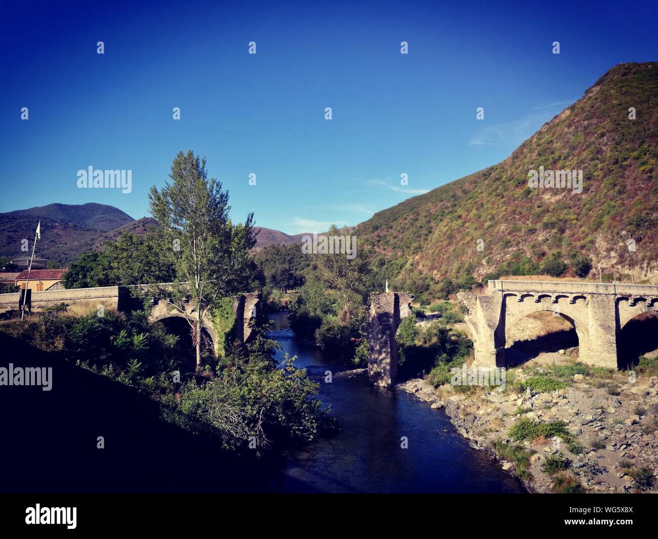 Broken bridge over river hi-res stock photography and images - Alamy