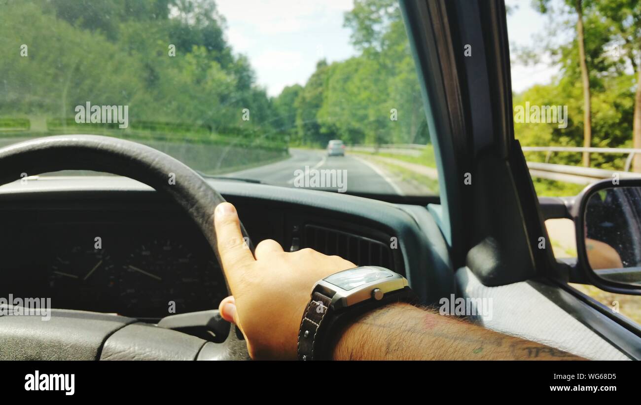 Car steering wheel hand hi-res stock photography and images - Alamy