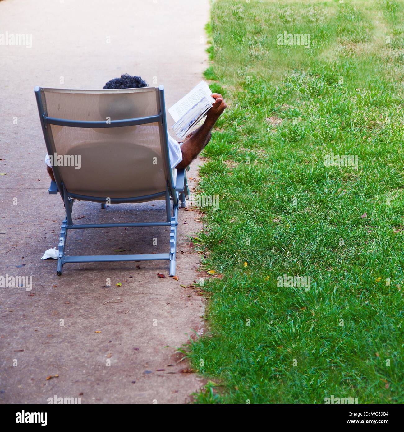 Man leaning on chair hi-res stock photography and images - Alamy