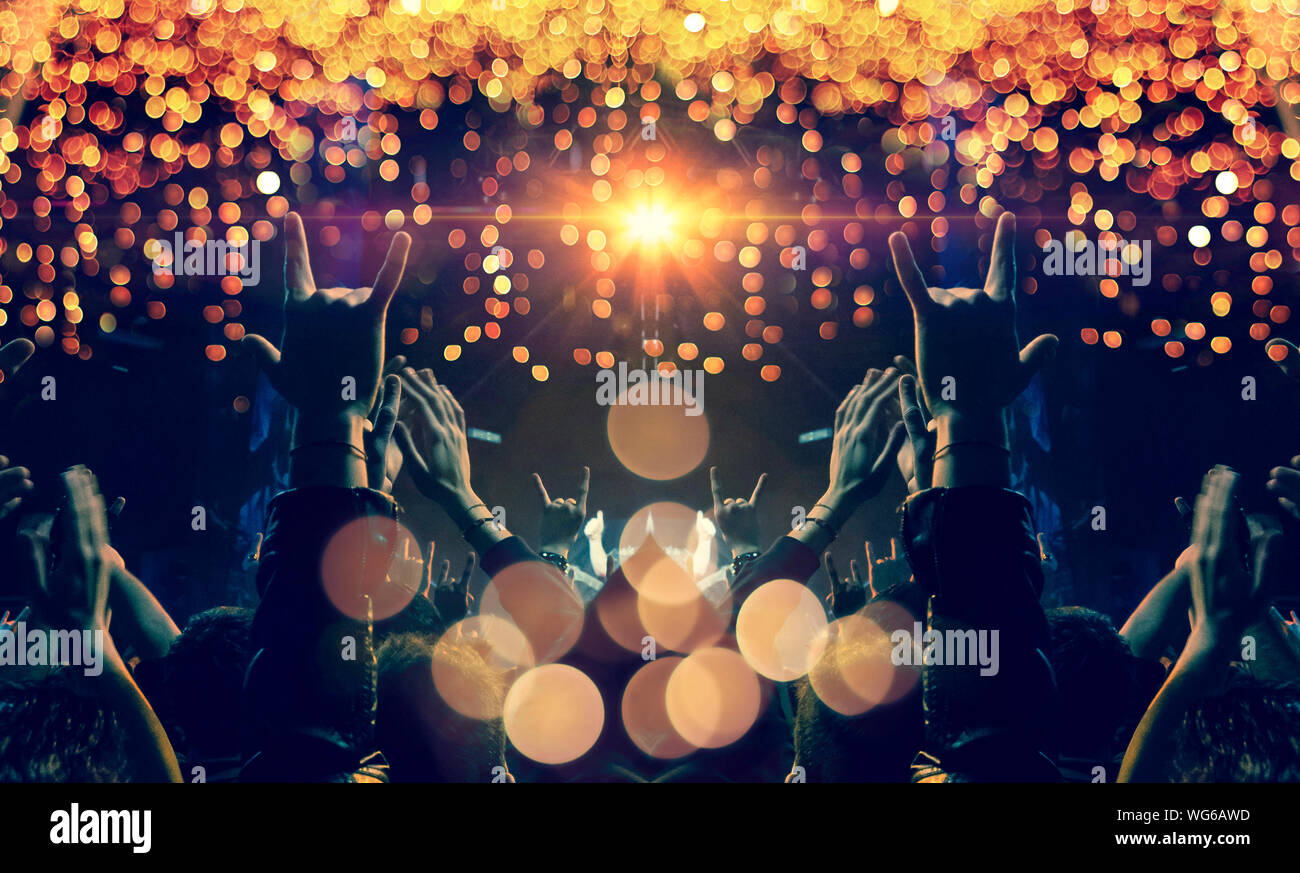 Concert hall crowded with clapping people Stock Photo - Alamy