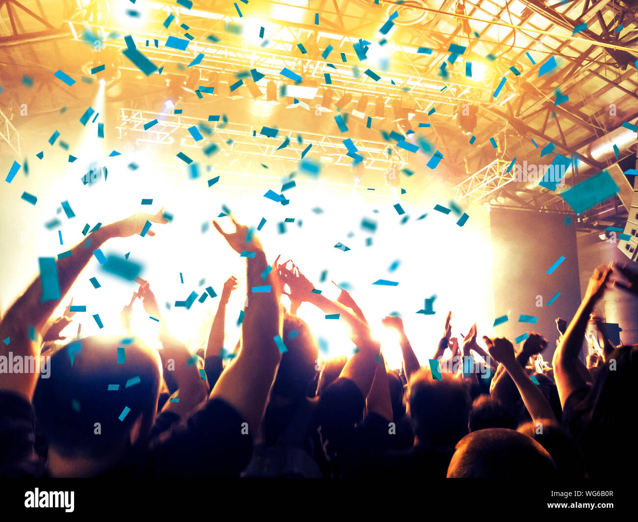 Concert hall crowded with clapping people Stock Photo - Alamy