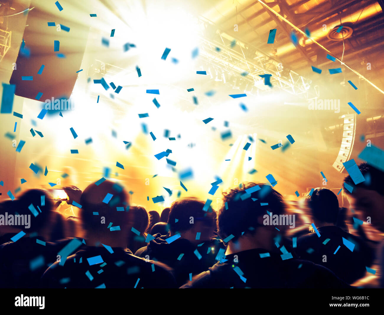 Concert hall crowded with clapping people Stock Photo - Alamy