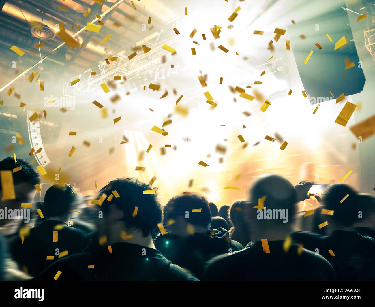 Concert hall crowded with clapping people Stock Photo - Alamy