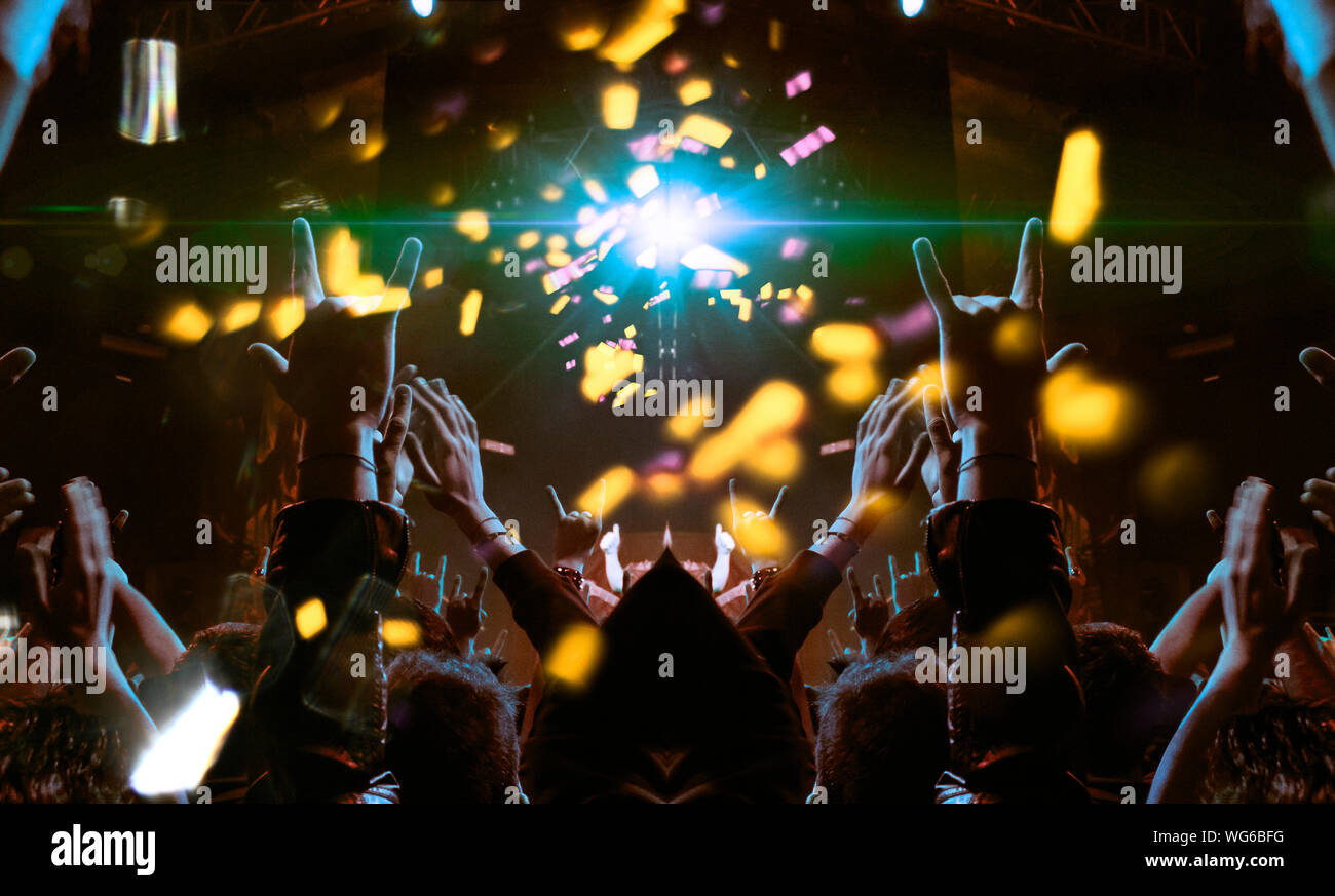 Concert hall crowded with clapping people Stock Photo - Alamy