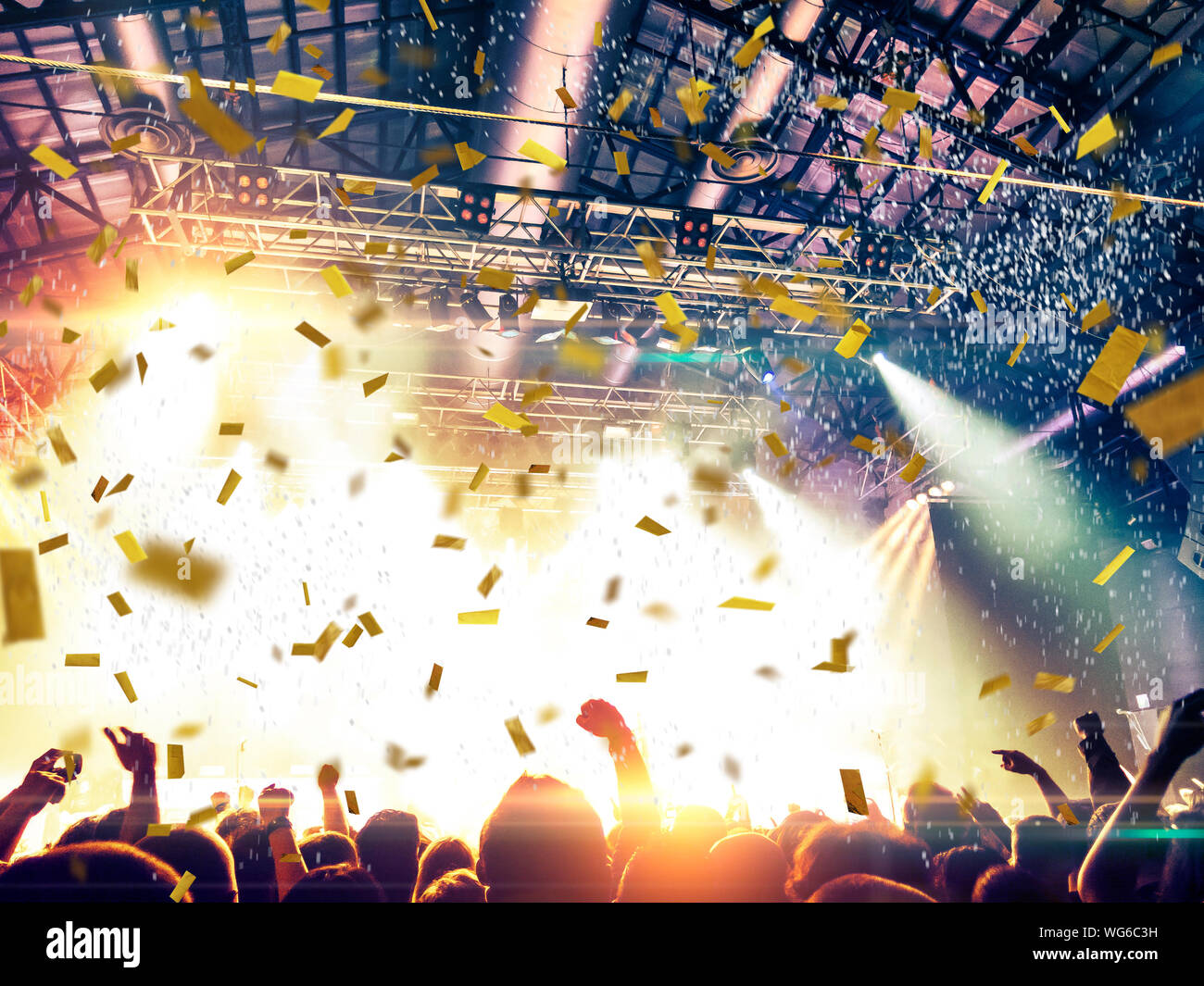 Concert hall crowded with clapping people Stock Photo - Alamy