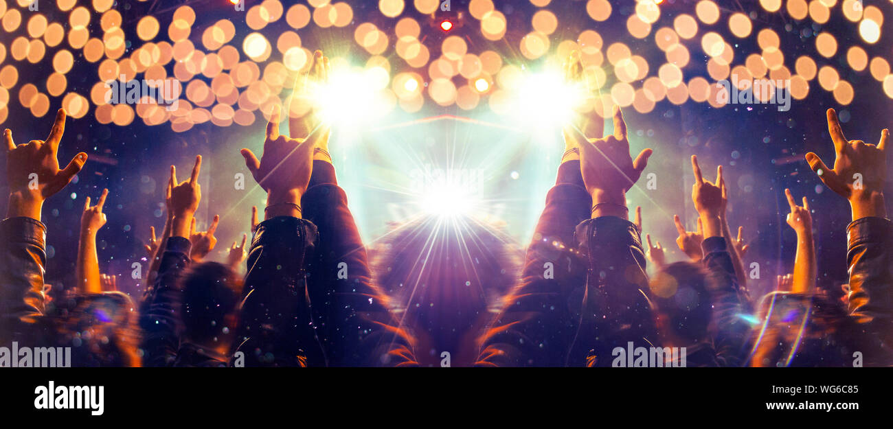 Concert hall crowded with clapping people Stock Photo - Alamy