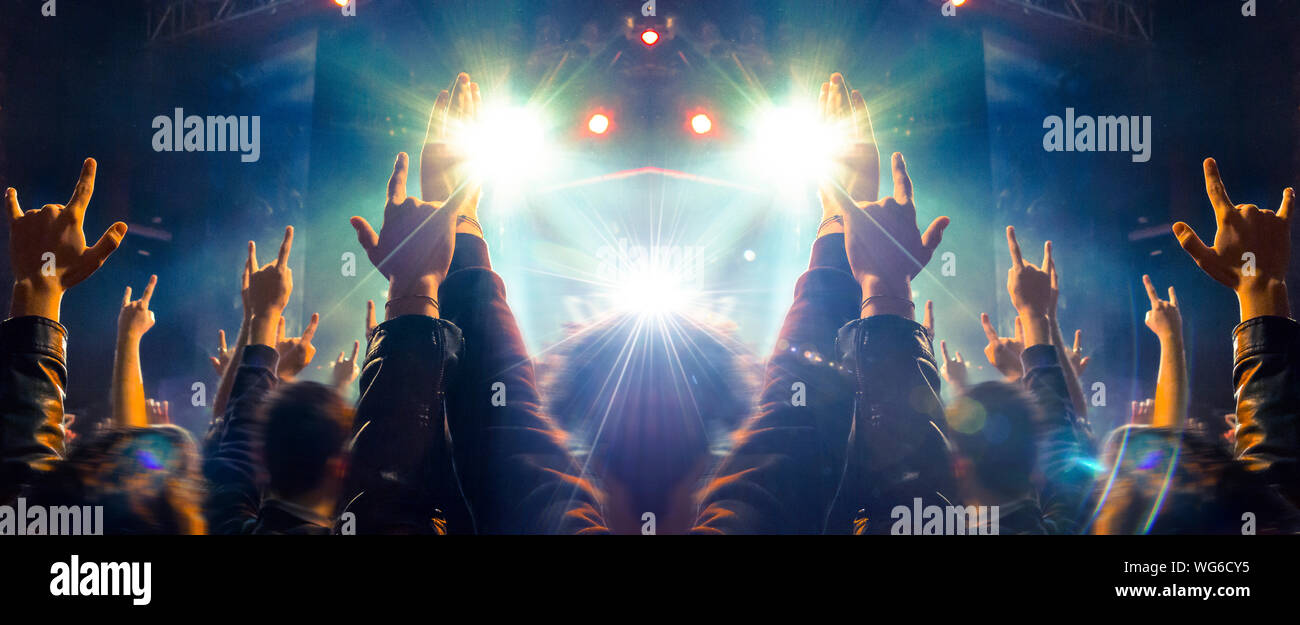 Concert hall crowded with clapping people Stock Photo - Alamy