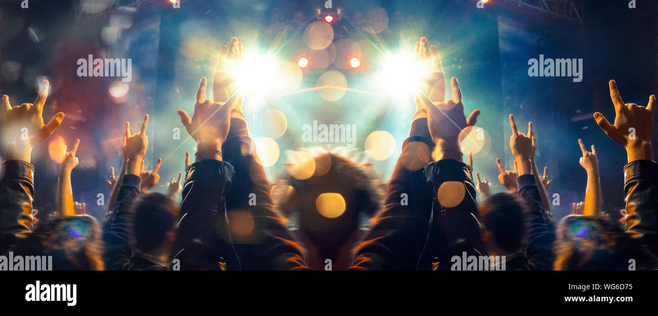 Concert hall crowded with clapping people Stock Photo - Alamy