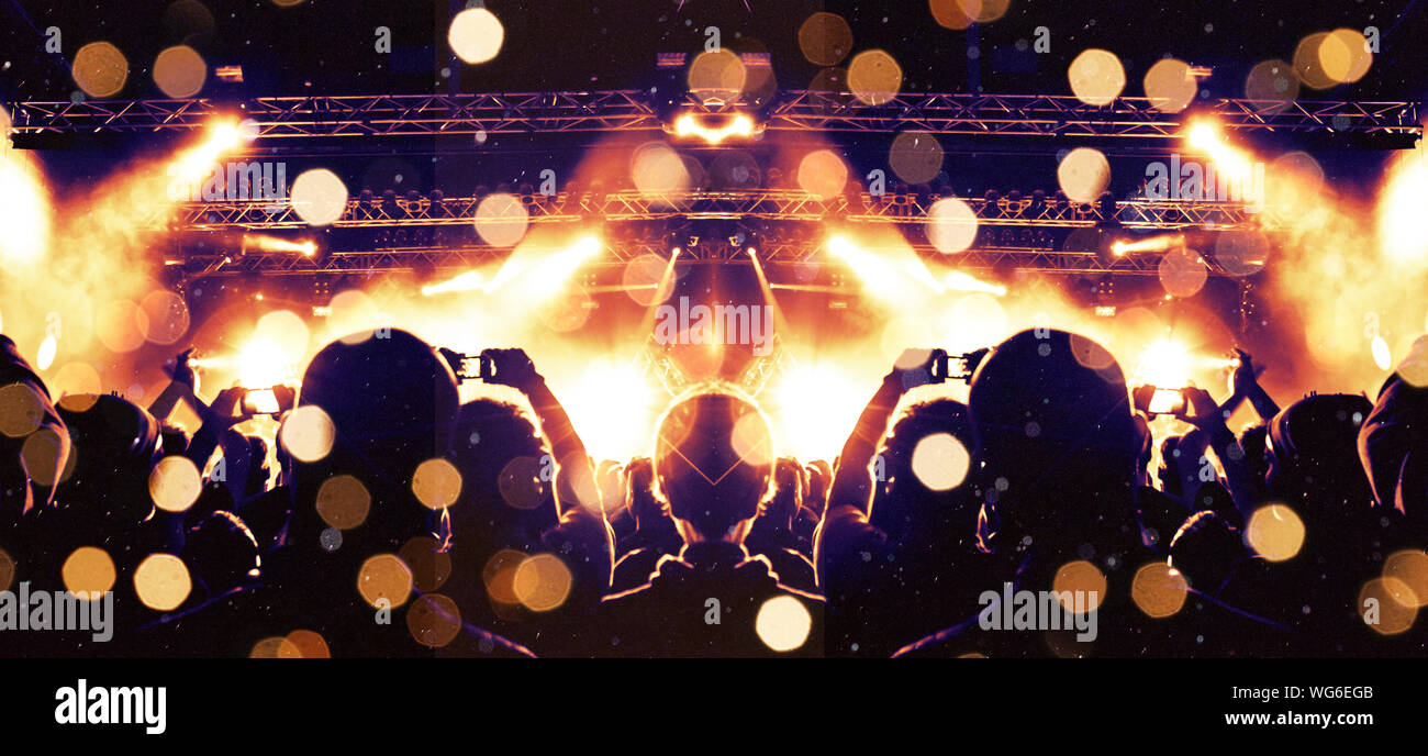 Concert hall crowded with clapping people Stock Photo - Alamy