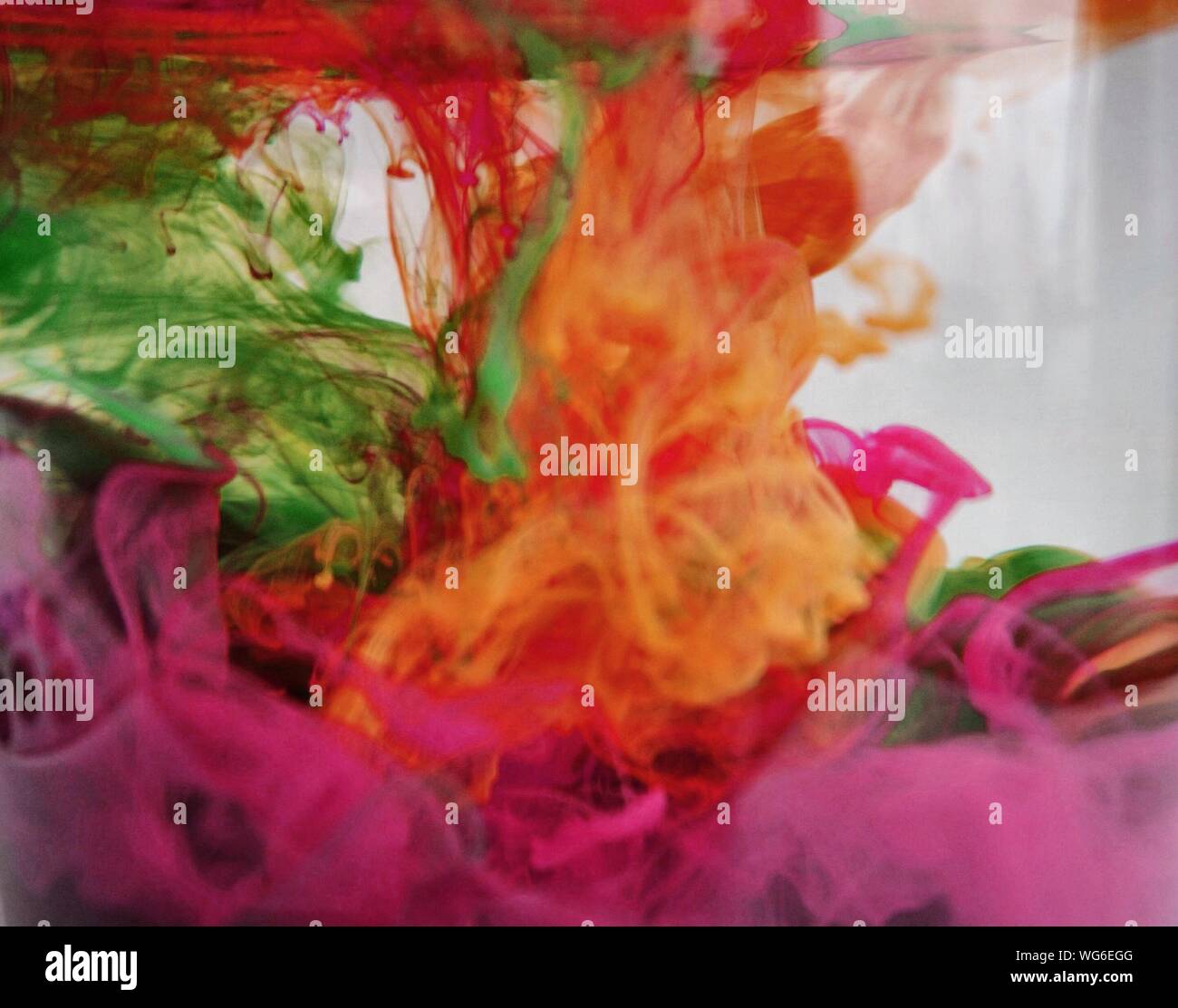 Mixing paint pouring hi-res stock photography and images - Alamy