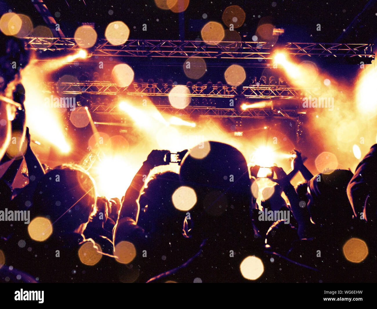 Concert hall crowded with clapping people Stock Photo - Alamy