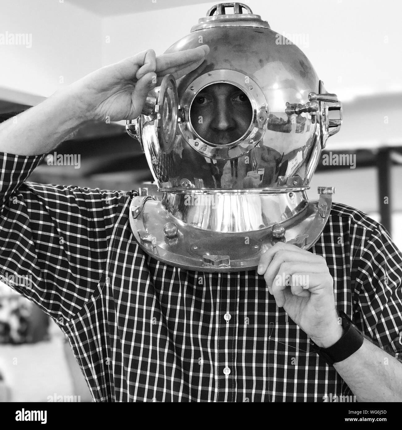 Diving helmet Black and White Stock Photos & Images - Alamy