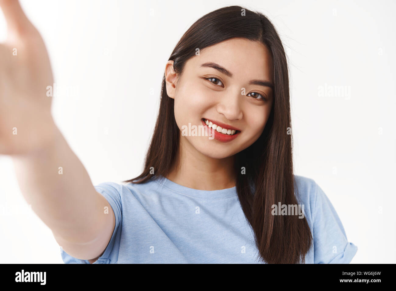 Authentic body-positive shot asian cute tender happy girl extend hand ...