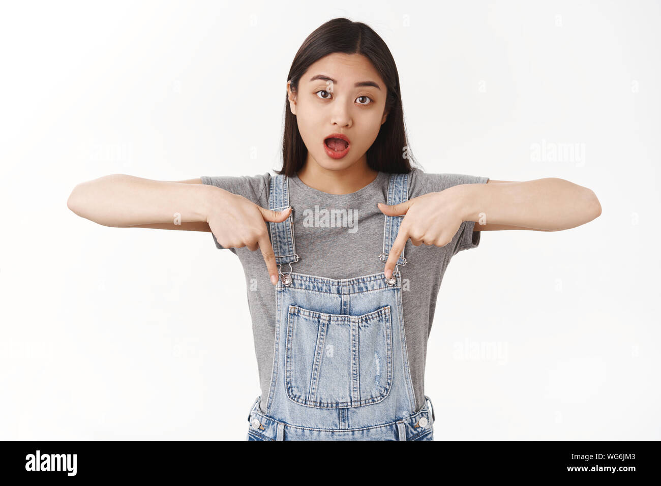 Wondered questioned curious asian girl asking question about ...