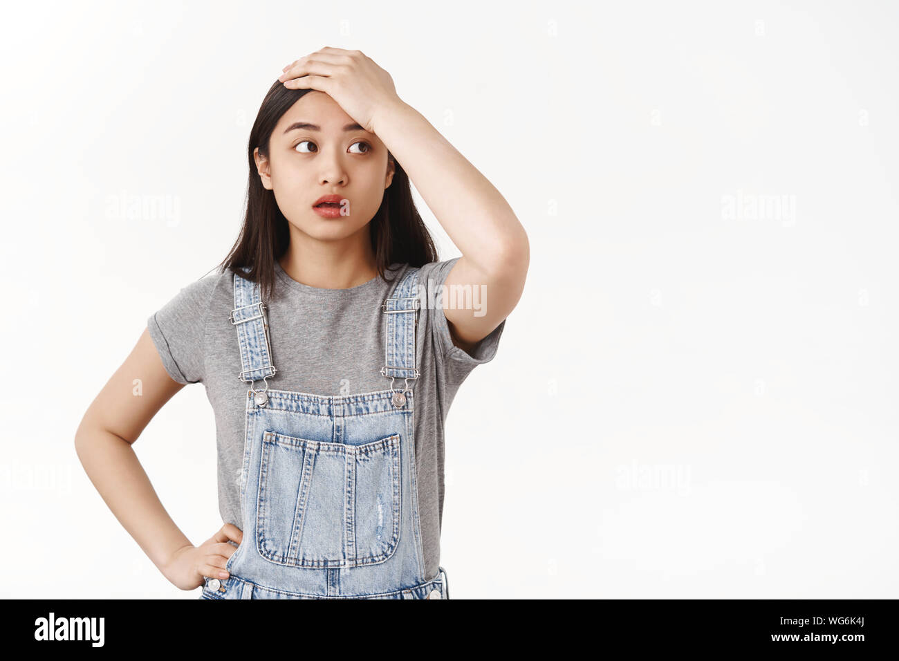 Tired tensed brunette asian girl bothered face troublesome situation ...