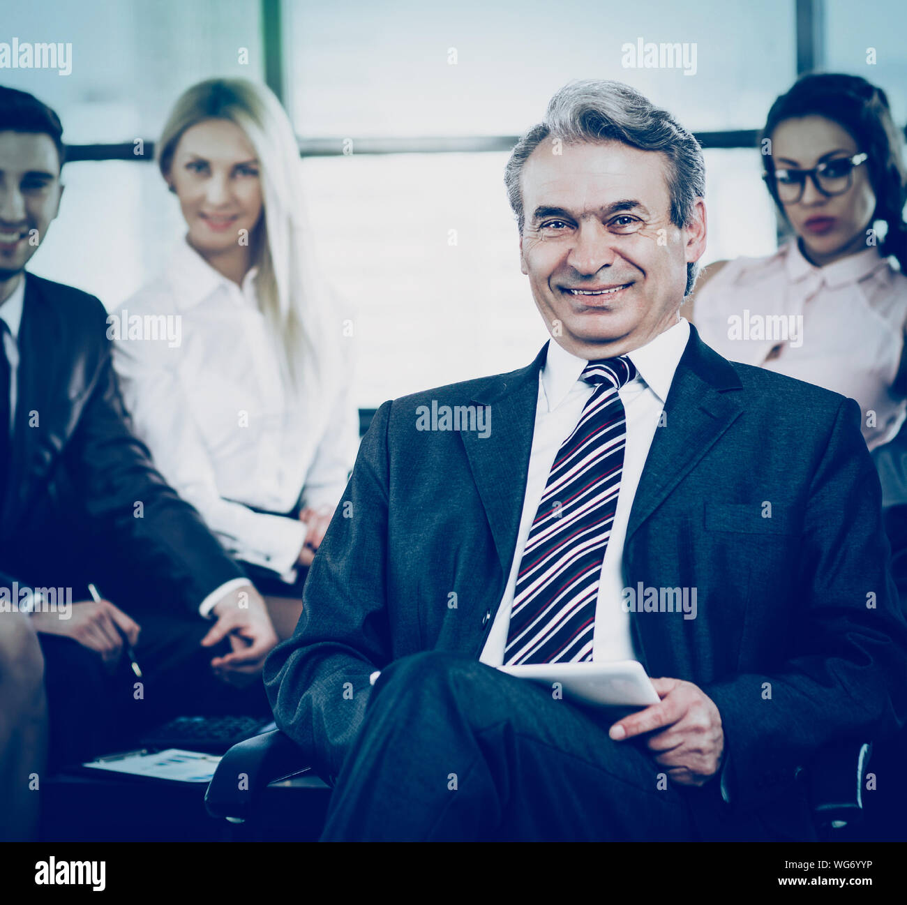 Portrait of a manager - the director of a close-up on a background of ...