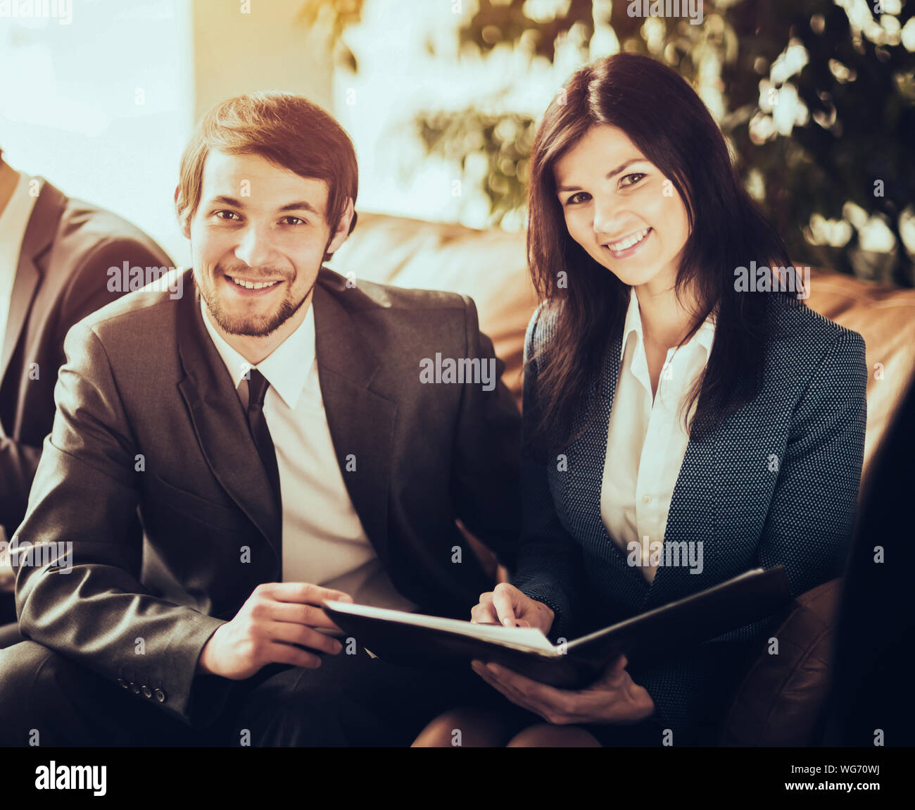 Group of successful businessmen. Discussion of important plans, smiling ...