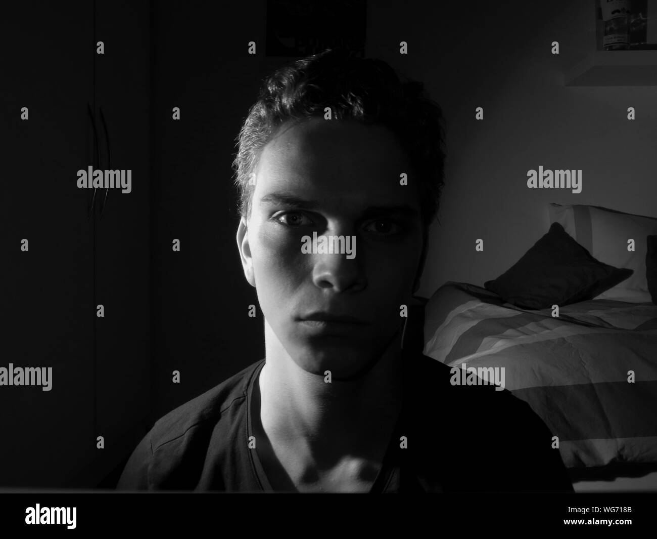 Man in bedroom hi-res stock photography and images - Alamy