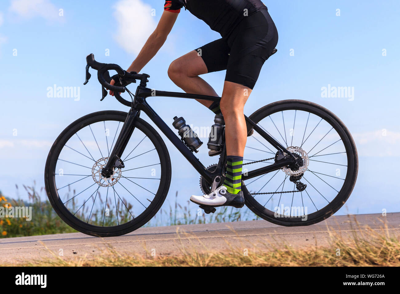 Man riding racing bicycle hi-res stock photography and images - Alamy
