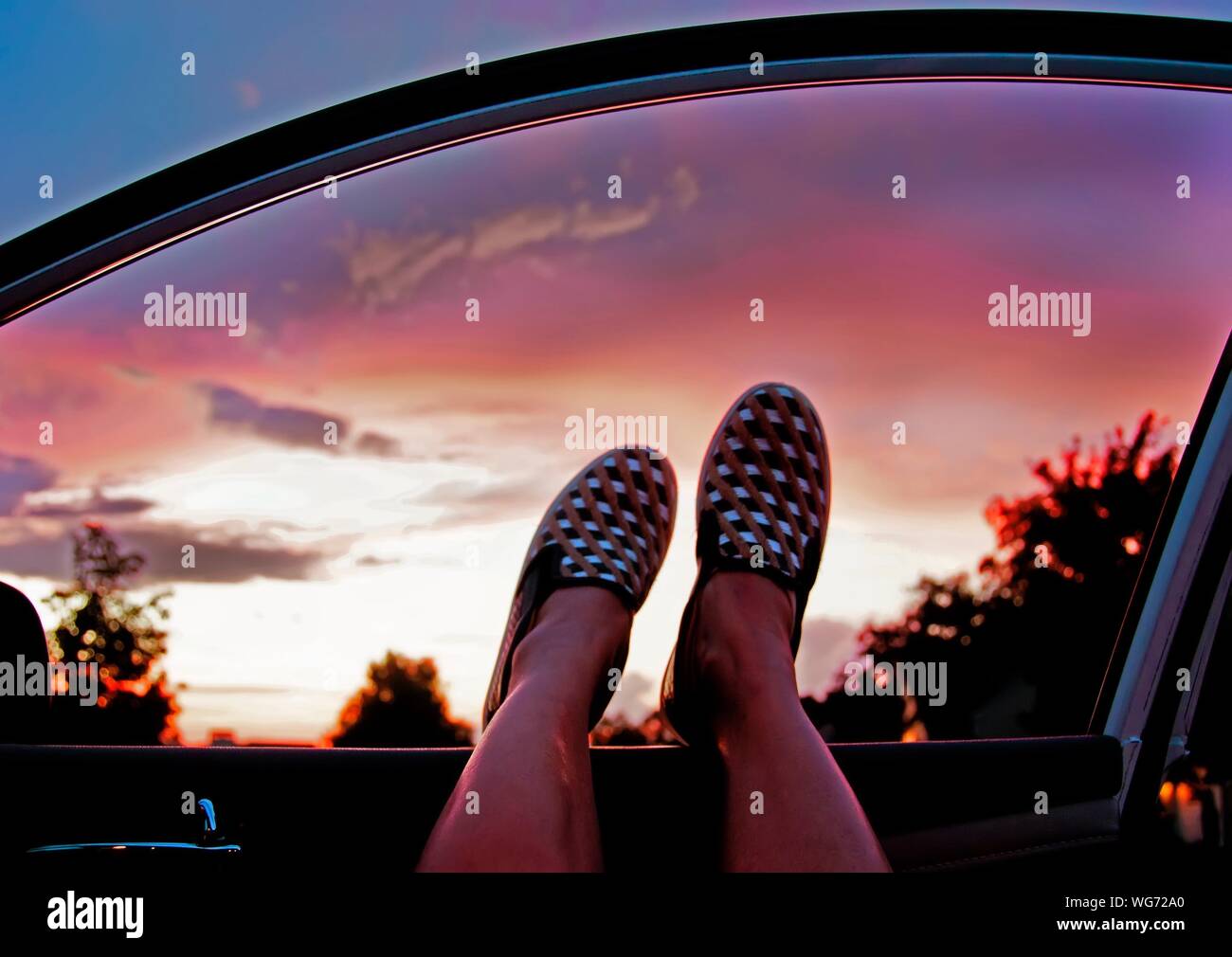 Feet car window hi-res stock photography and images - Alamy