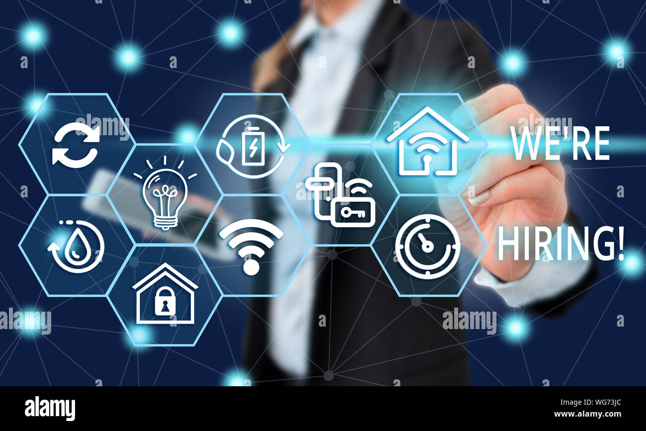 Text sign showing We Re Hiring. Business photo showcasing process of ...