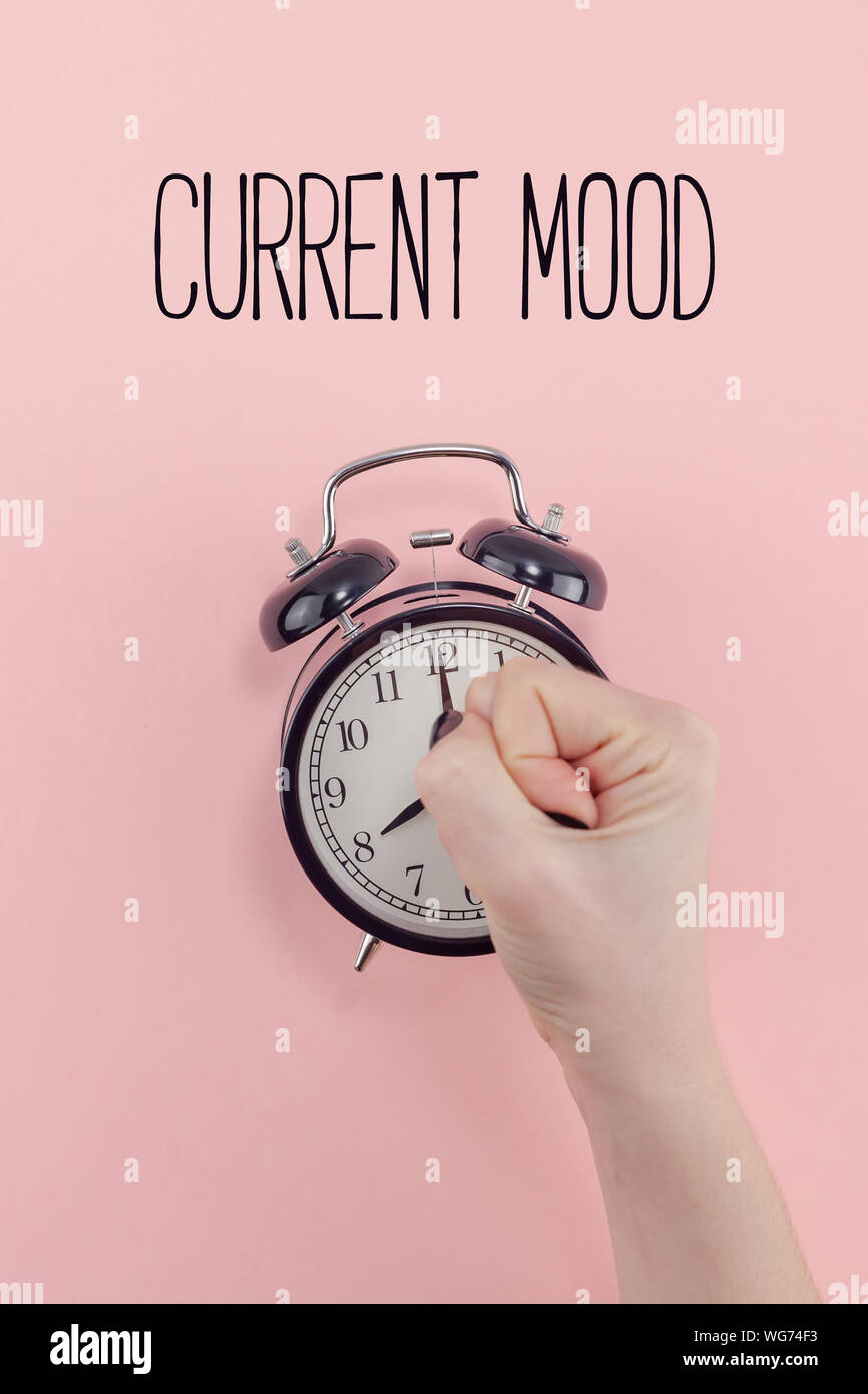 Creative flat lay morning time emotions concept top view of woman hand ...