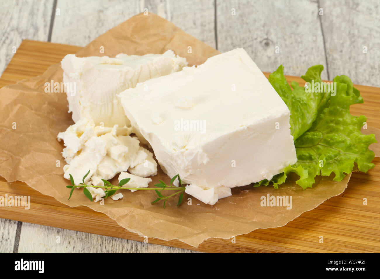 Greek traditional Feta soft cheese in the plate Stock Photo - Alamy