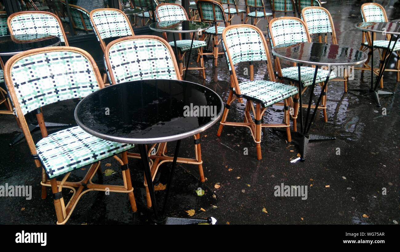 Wet tables and chairs hi-res stock photography and images - Alamy