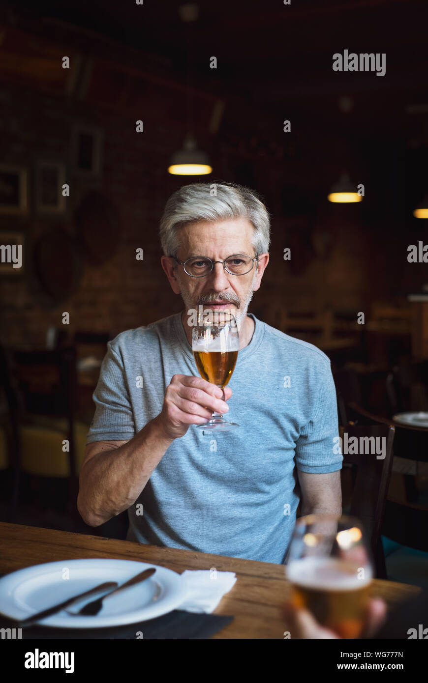 Old man drinking beer hi-res stock photography and images - Alamy